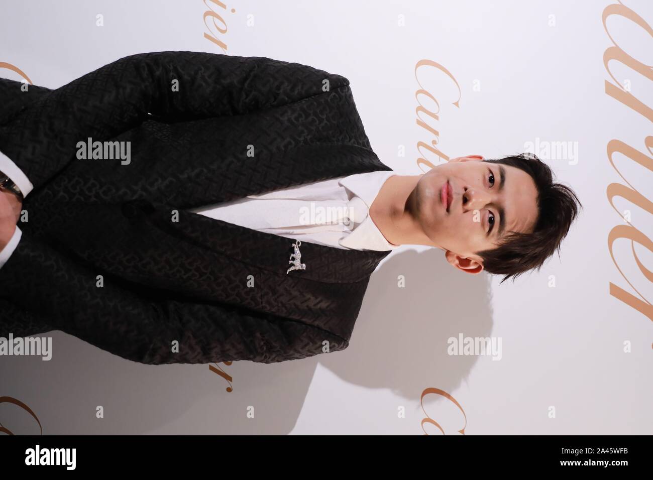 Chinese actor Li Xian suits up at 2019 Cartier Magnitude High-end ...