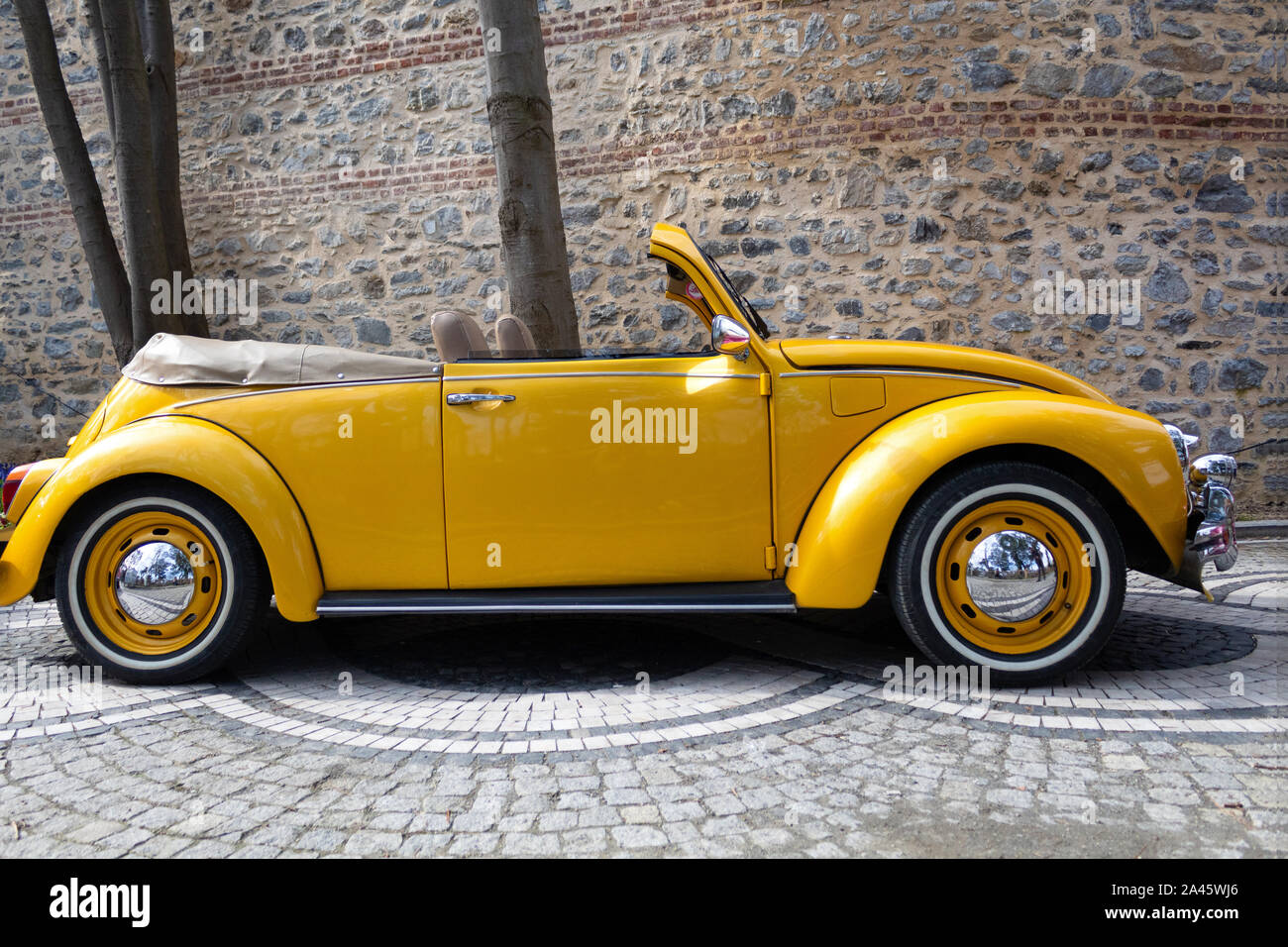 Right perspective view of yellow convertible classic car Stock Photo ...