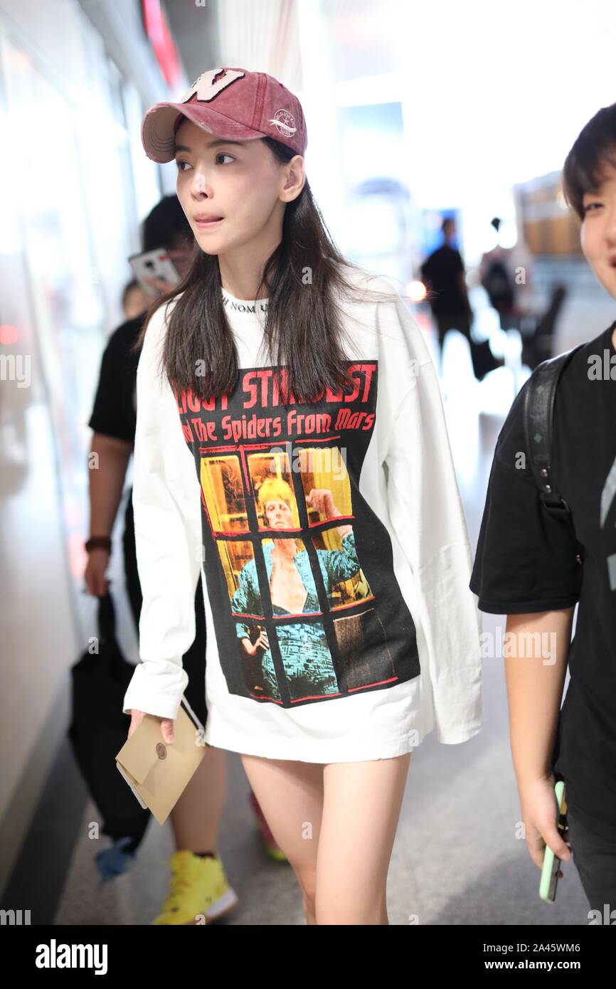 Chinese-Canadian actress and singer Kelly Yu or Yu Wenwen, middle ...