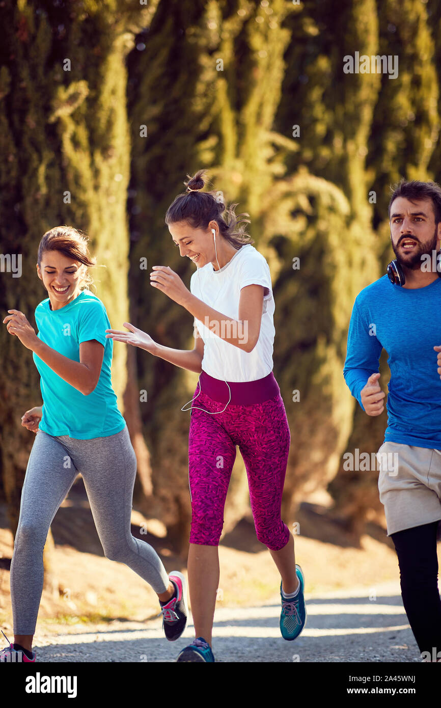 Happy people group running hi-res stock photography and images - Alamy