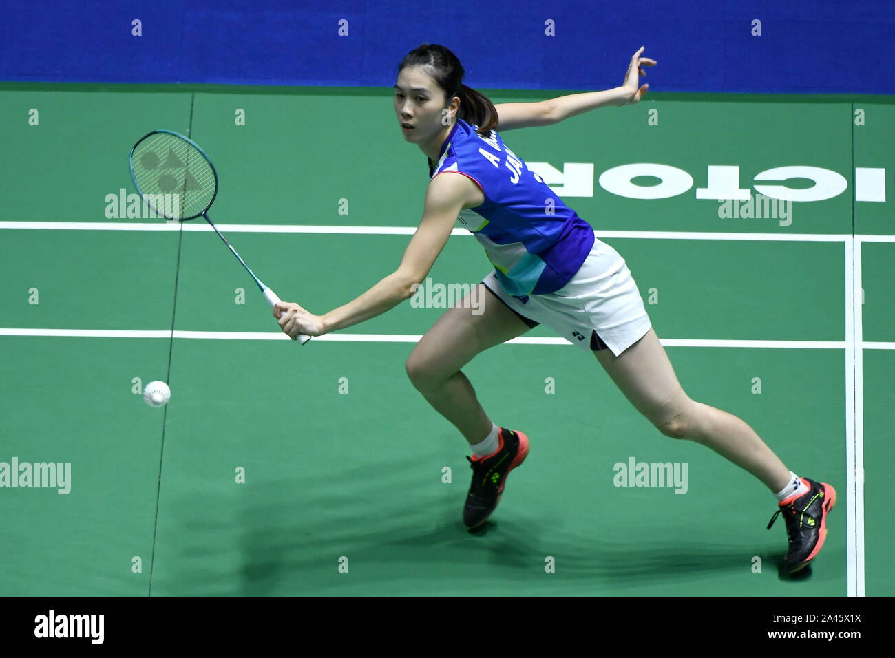 Japanese professional badminton player Aya Ohori competes against Hong ...