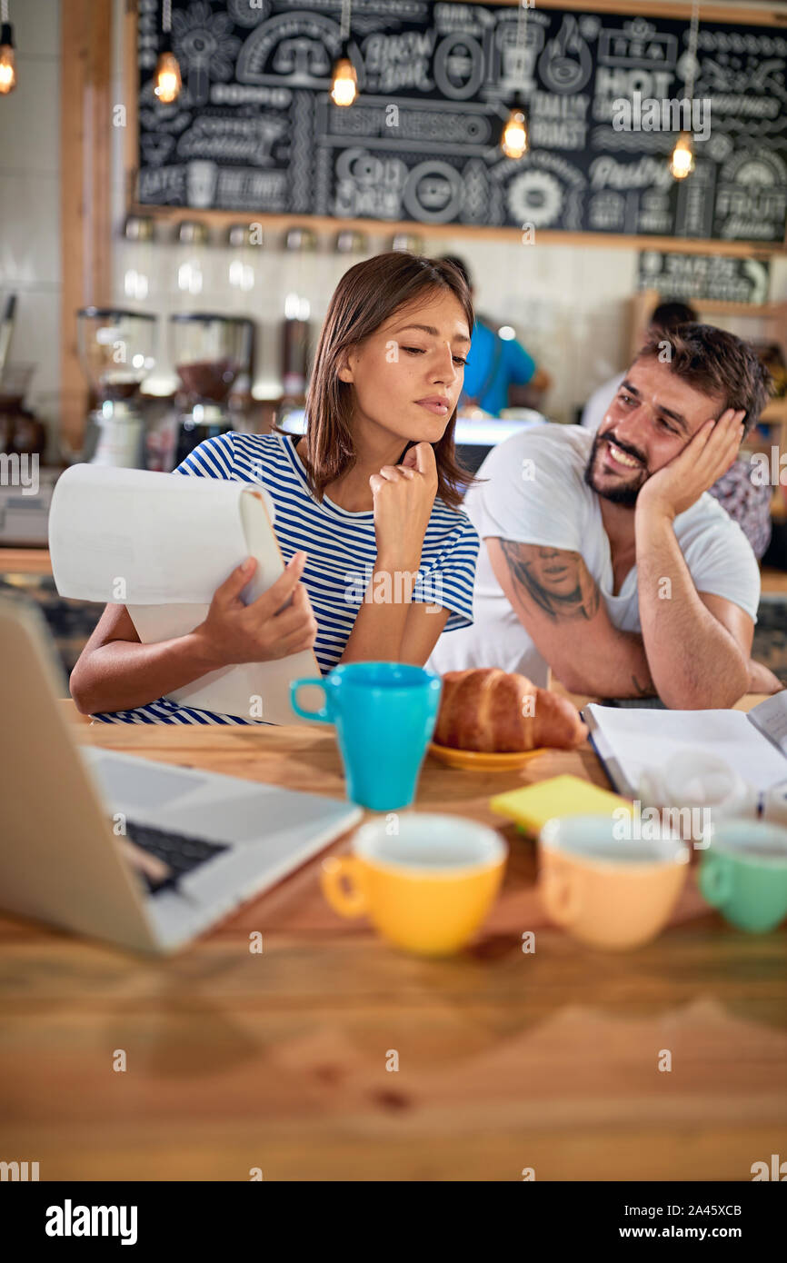 Coffee business concept.Young happy people work to open their cafe ...