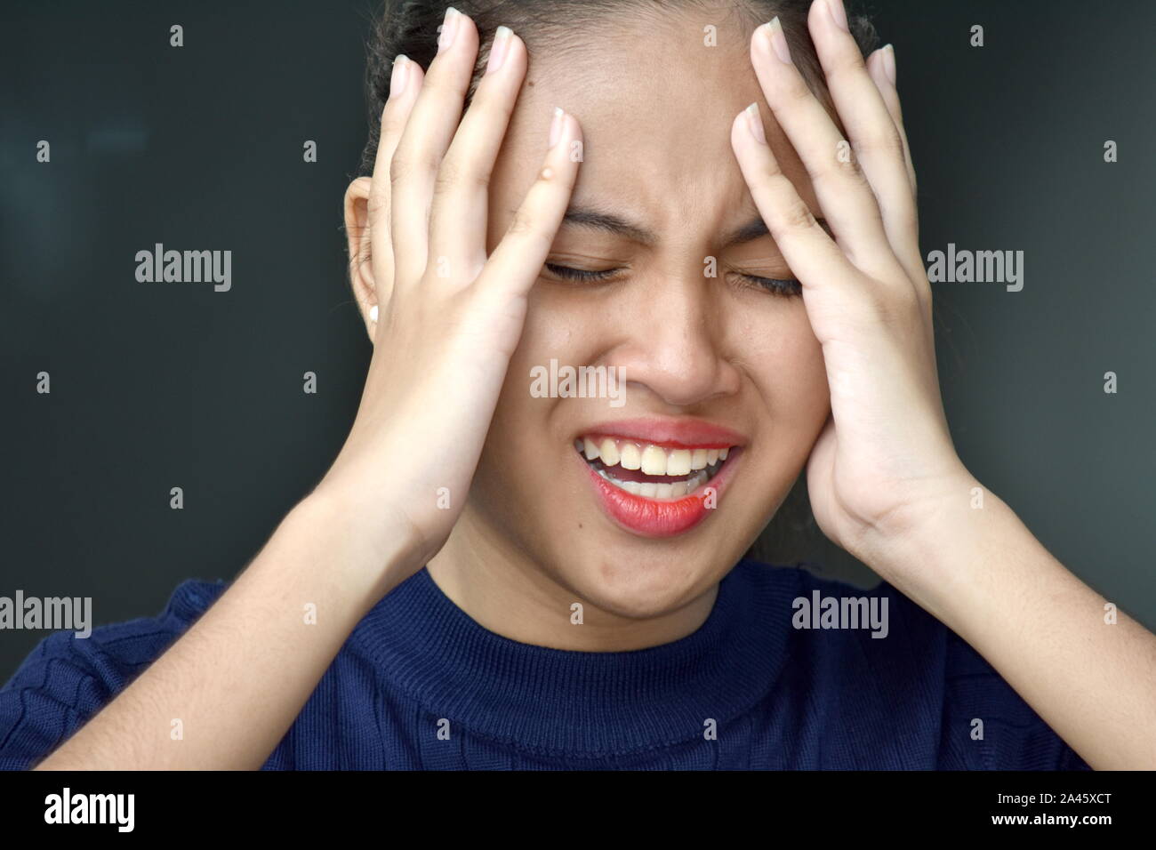 An Anxious Young Diverse Person Stock Photo - Alamy