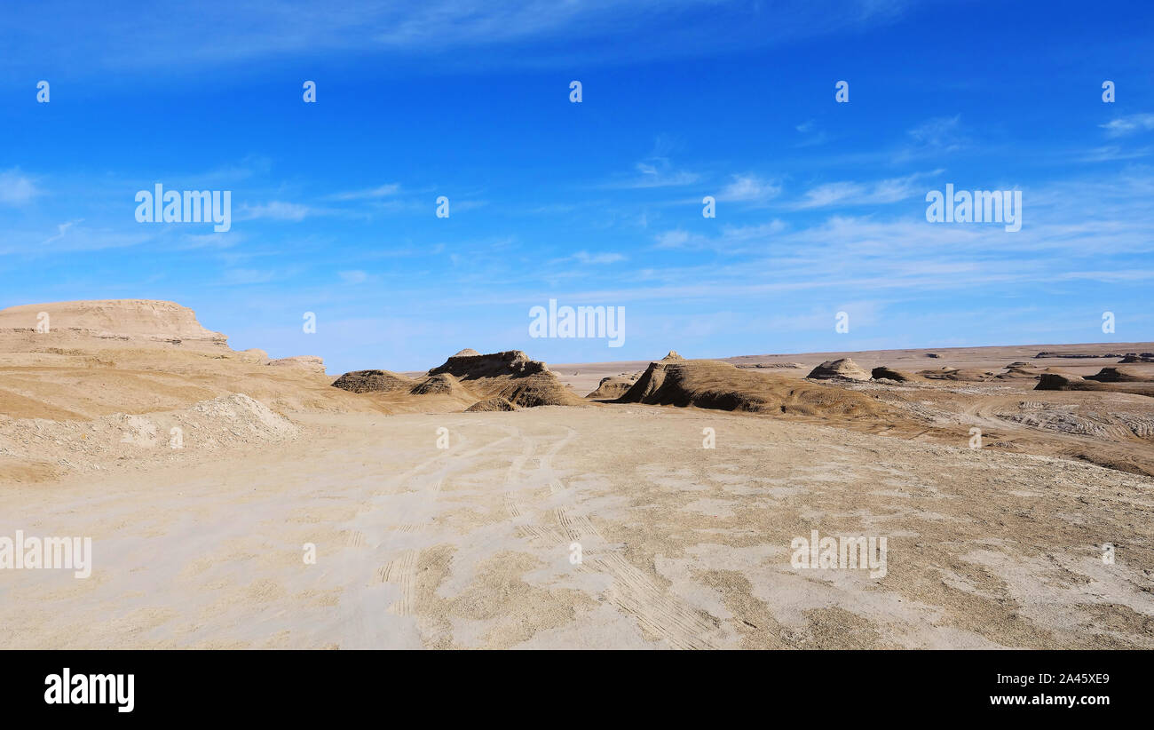 Landscape view of sunny blue sky and desert ground in Qinghai China ...