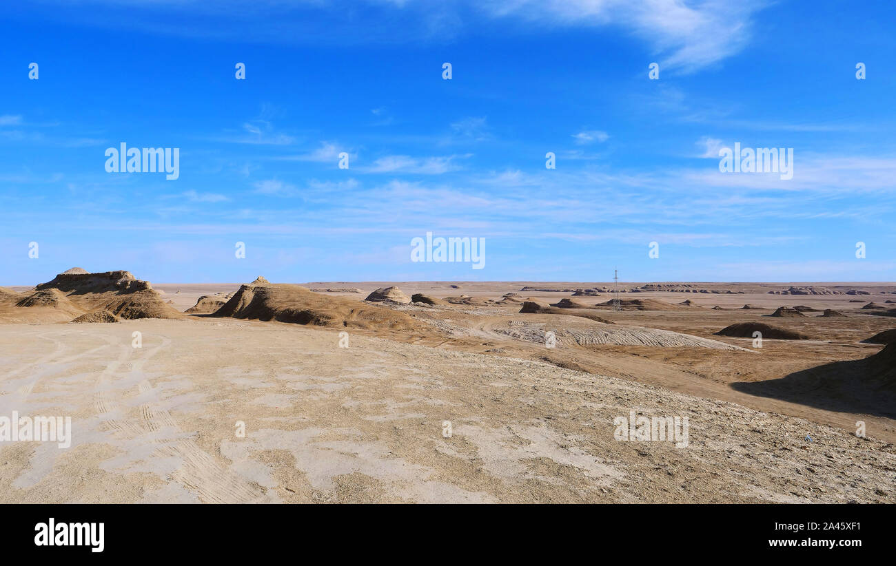 Landscape view of sunny blue sky and desert ground in Qinghai China ...
