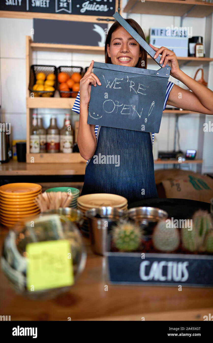Employee woman opening hi-res stock photography and images - Alamy