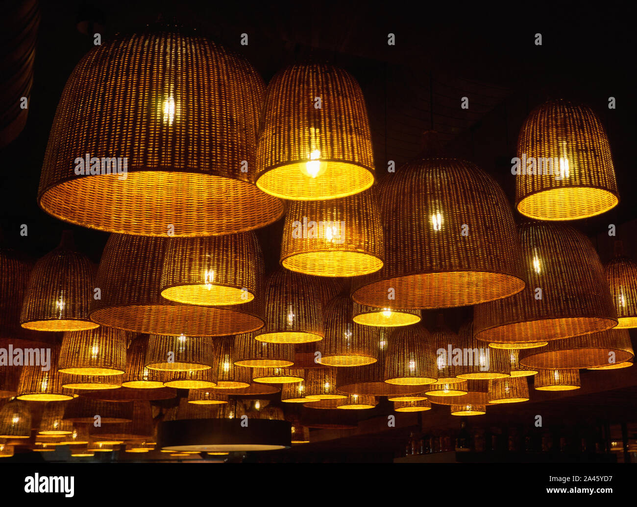 Local shaped lamps on ceiling against dark background, many local ...