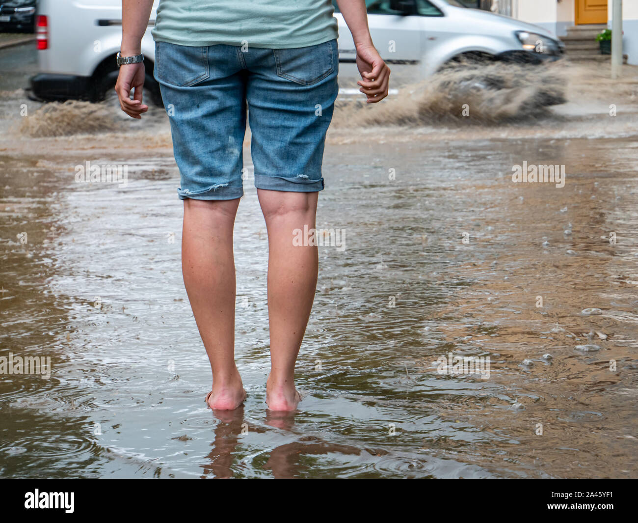 Woman floods flooding hi-res stock photography and images - Alamy