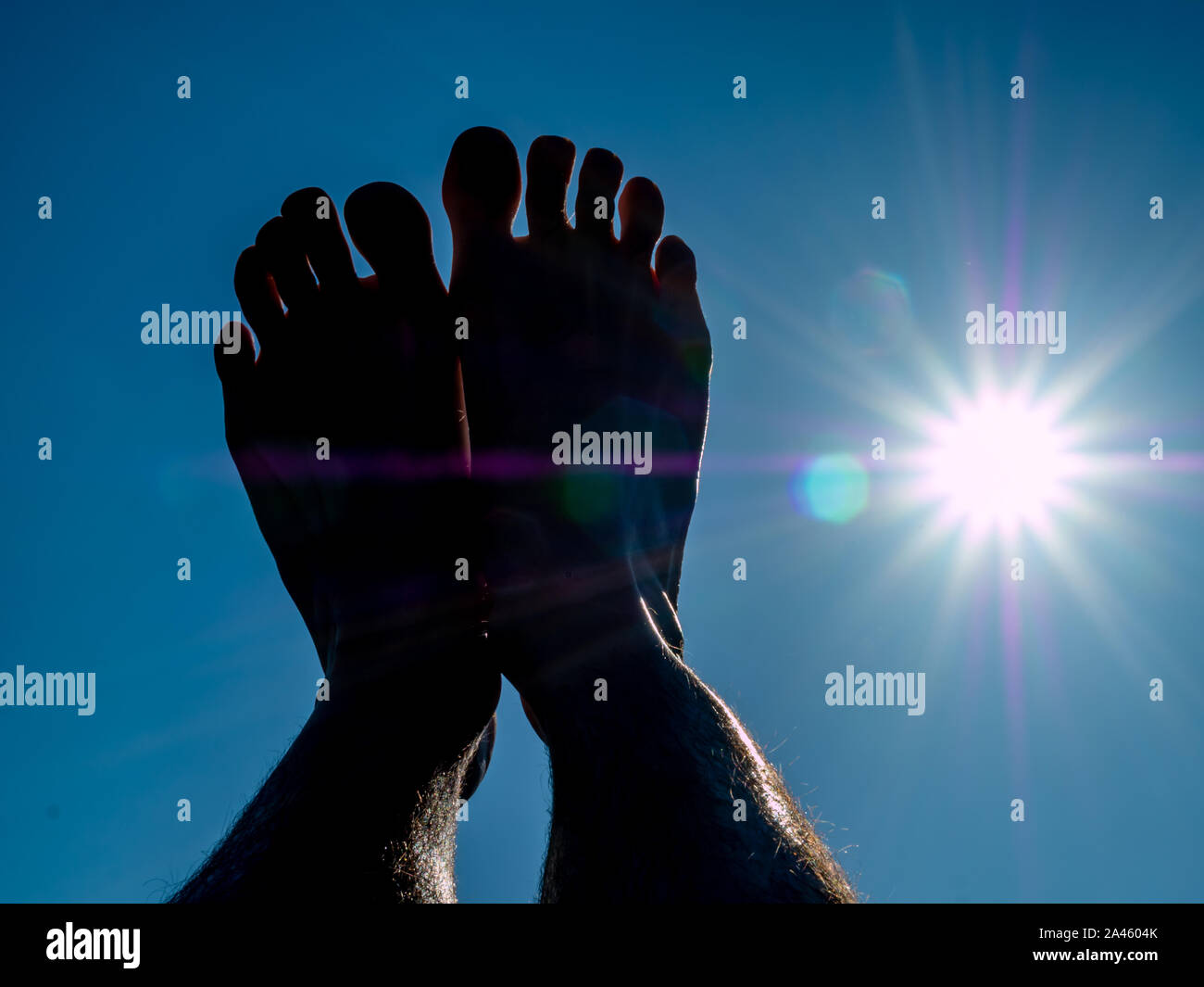 Sunbeam on woman feet hi-res stock photography and images - Alamy