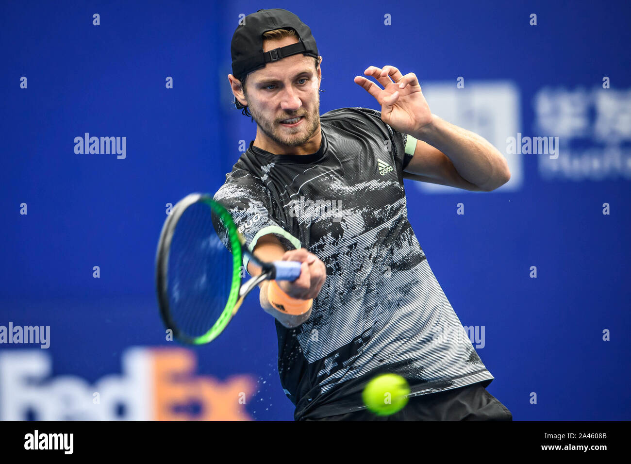 French professional tennis player Lucas Pouille competes against South ...