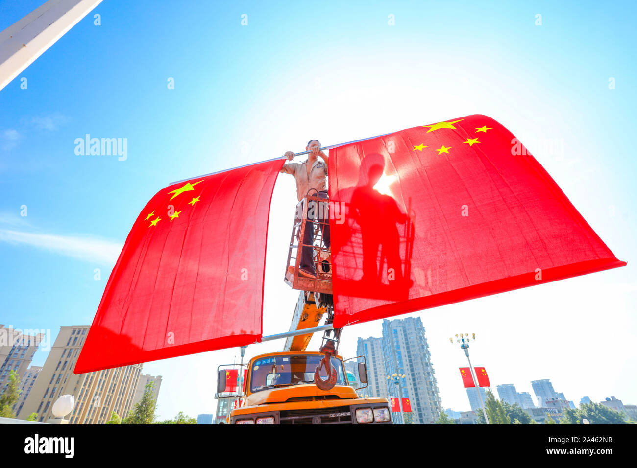 Chinese national flags hang hi-res stock photography and images - Alamy