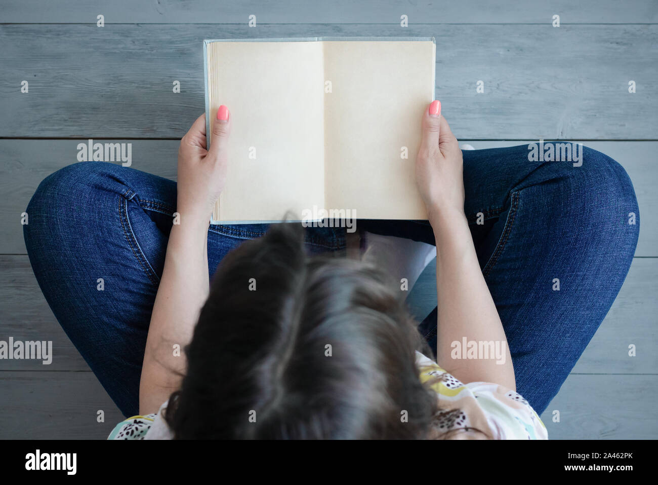 Woman is reading a blank page book with copy space. Student concept ...
