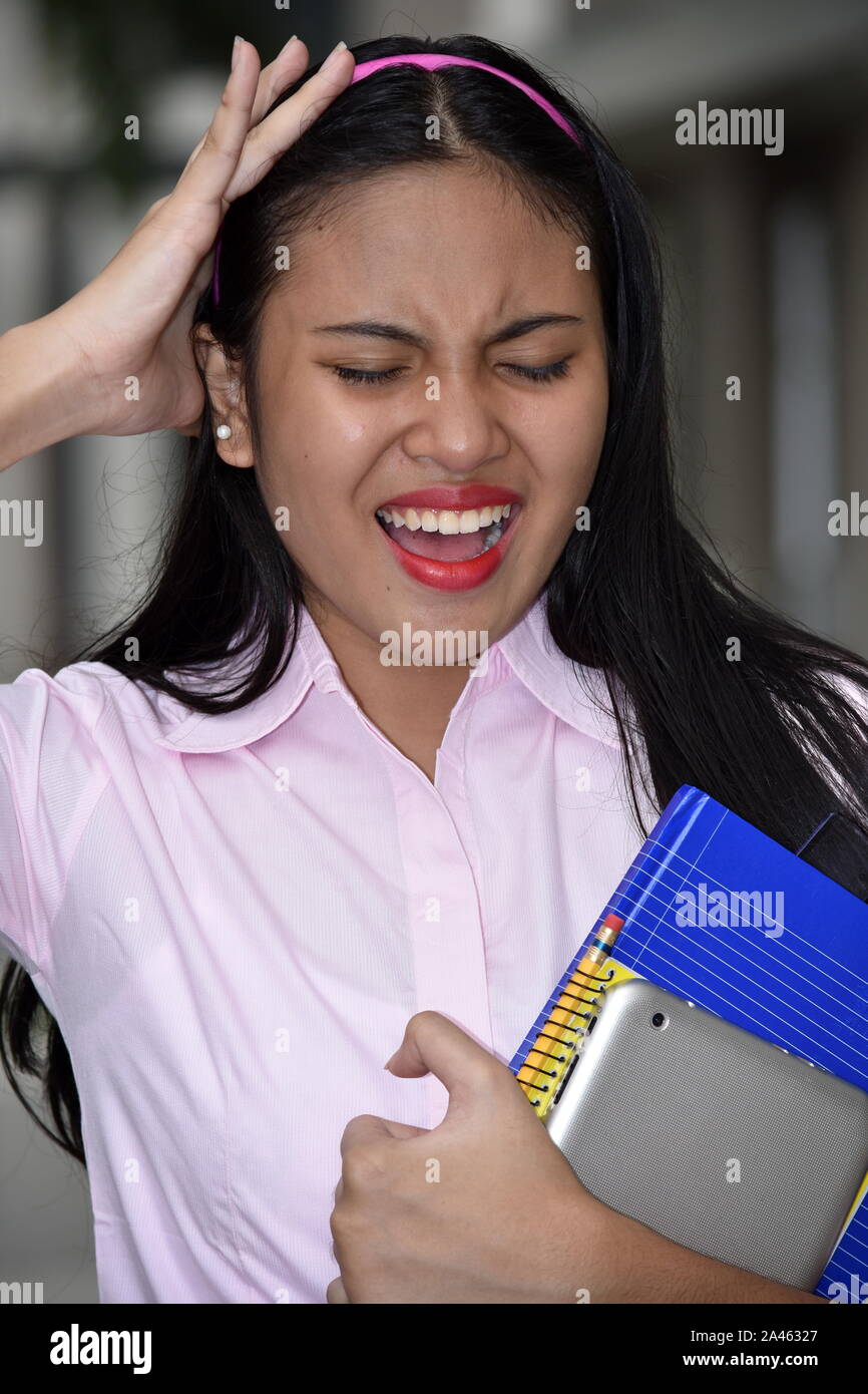 An Anxious Cute Asian Girl Student Stock Photo - Alamy