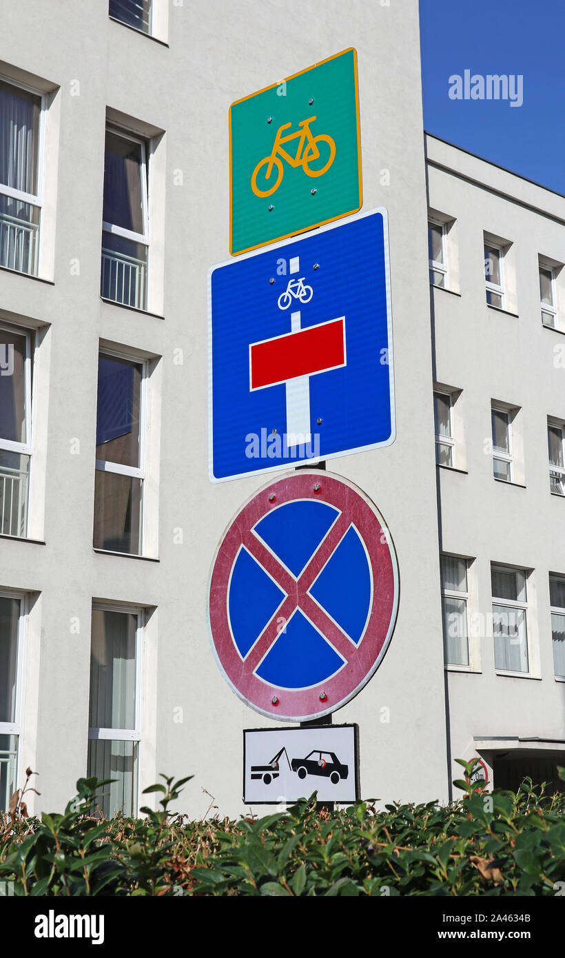Traffic signs in front of a building Stock Photo - Alamy