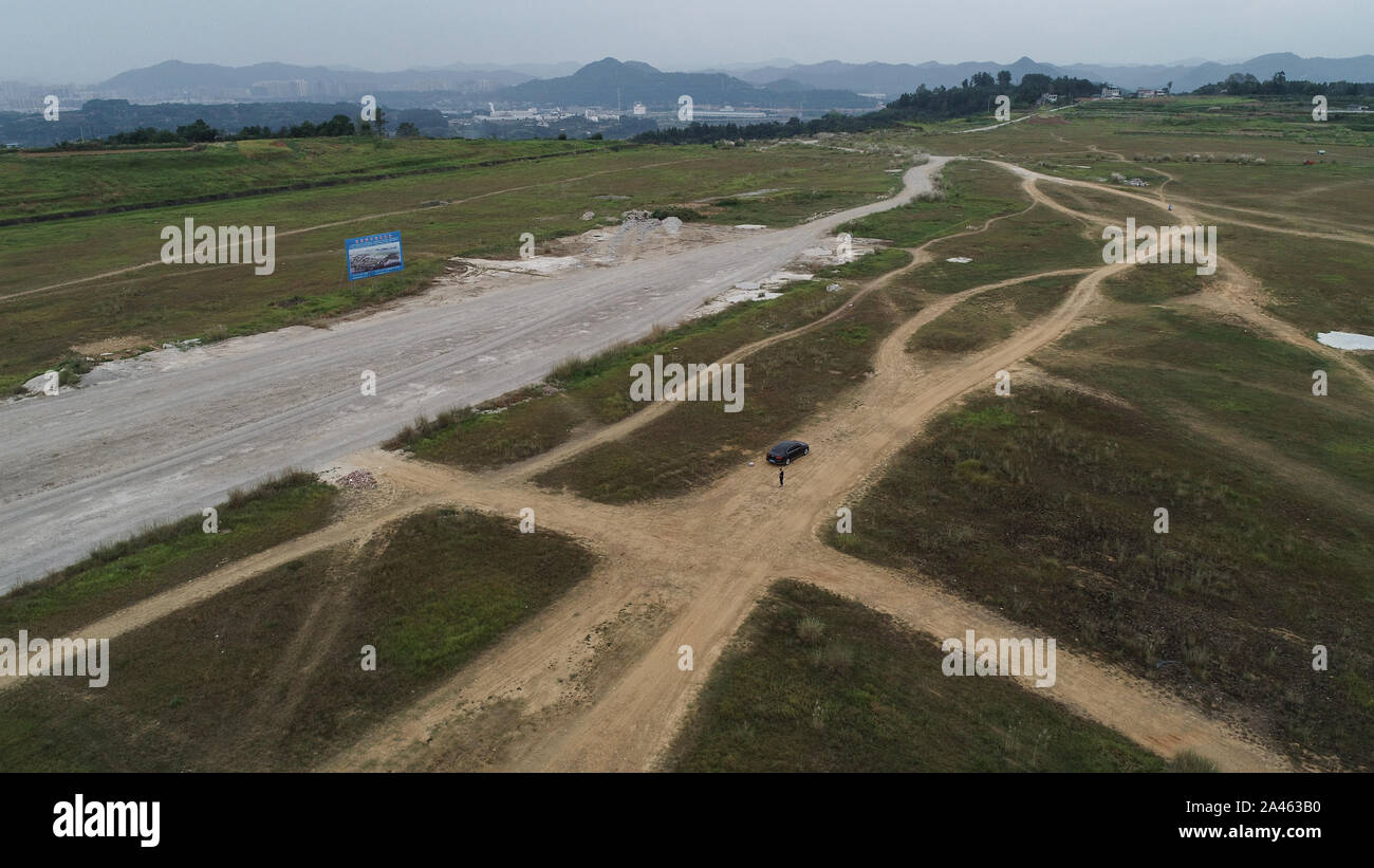 Aerial view of the Langzhong Airport under construction in Shilong town ...