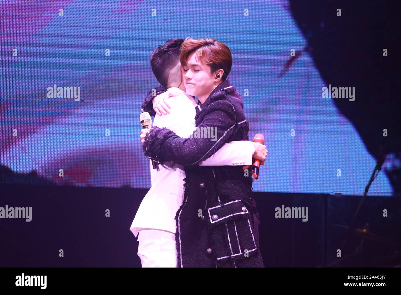 Hong Kong singer and songwriter Hins Cheung, right, appears and sings ...