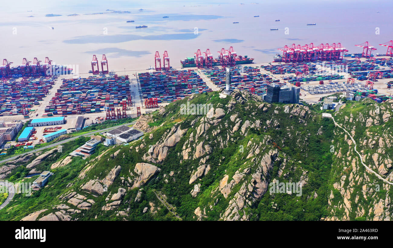 An aerial view of containers stored at Yangshan Port, a deep water port ...