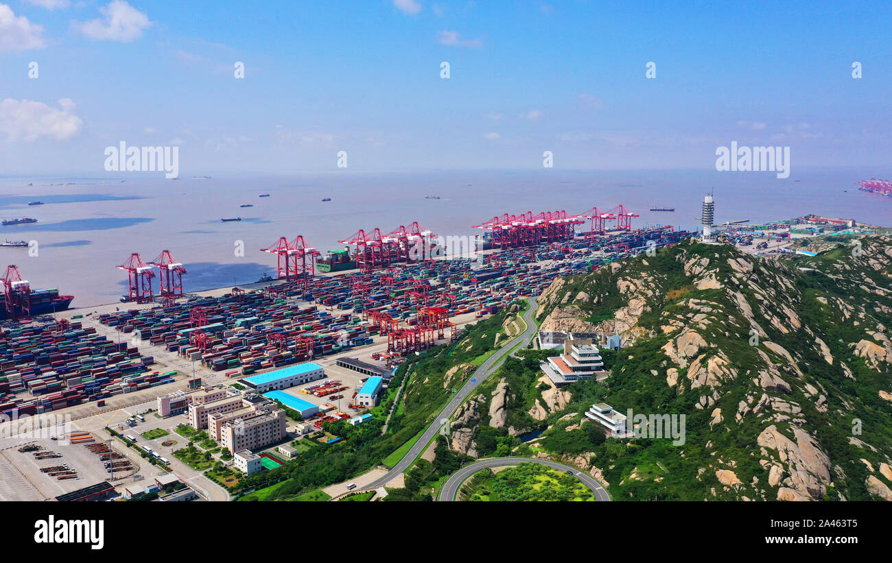 An aerial view of containers stored at Yangshan Port, a deep water port ...