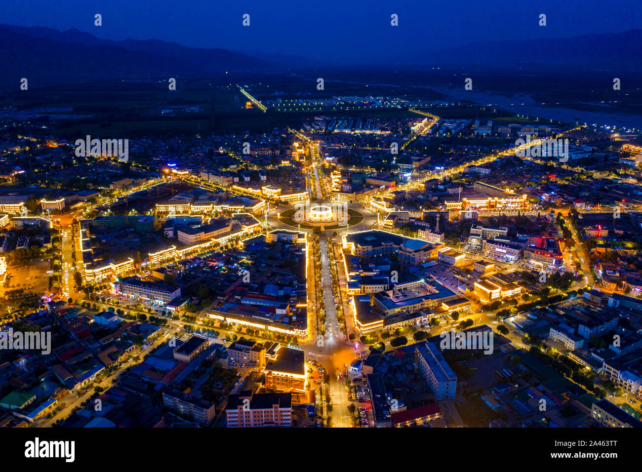 An aerial night view of roads and streets in Tekes county, Ili Kazakh ...