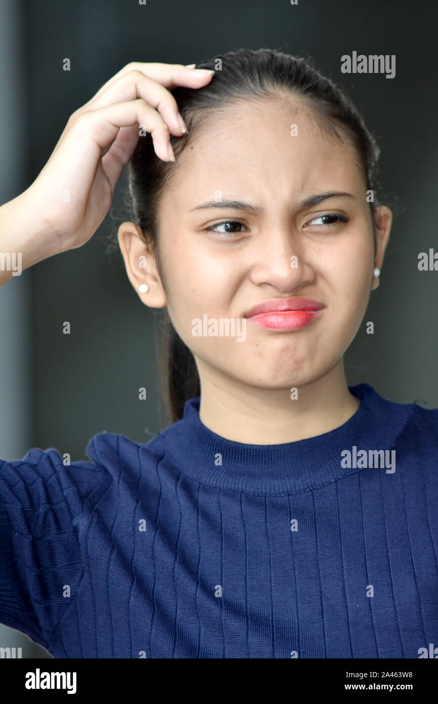 Confused Cute Asian Youth Stock Photo - Alamy