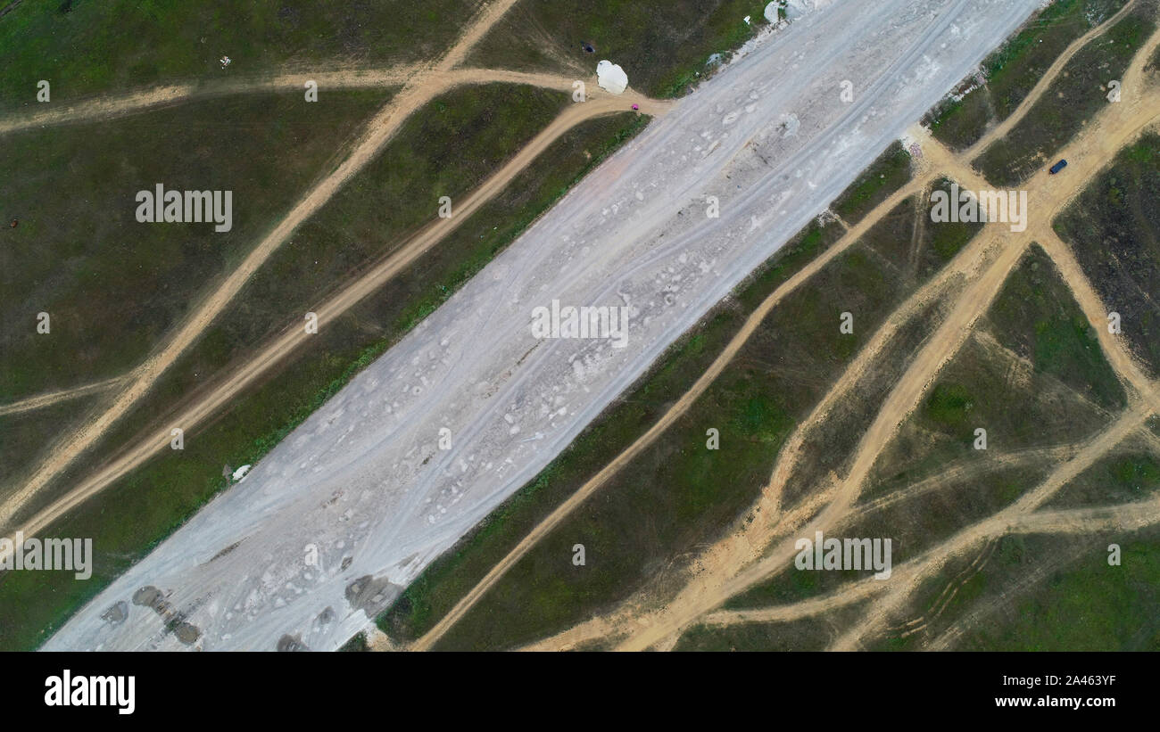 Aerial view of the Langzhong Airport under construction in Shilong town ...