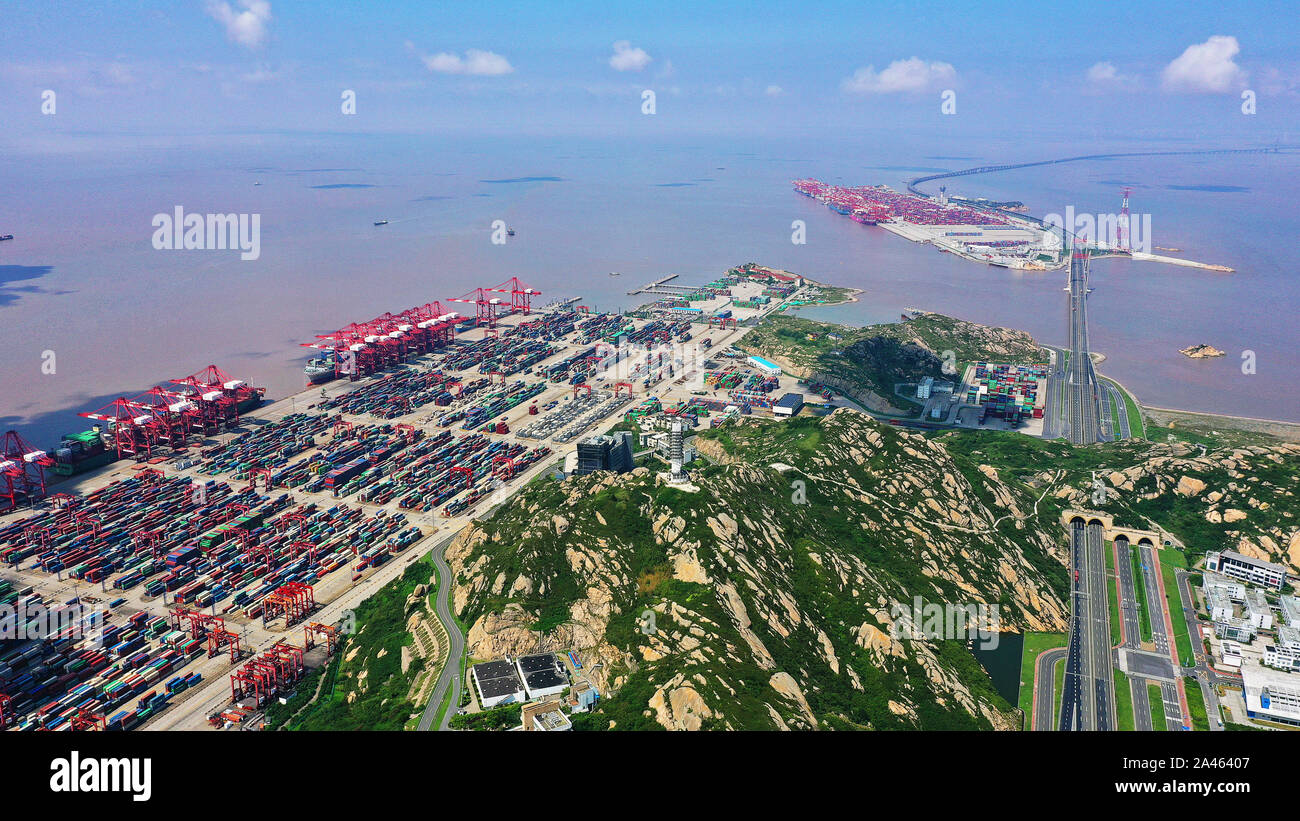 An aerial view of containers stored at Yangshan Port, a deep water port ...
