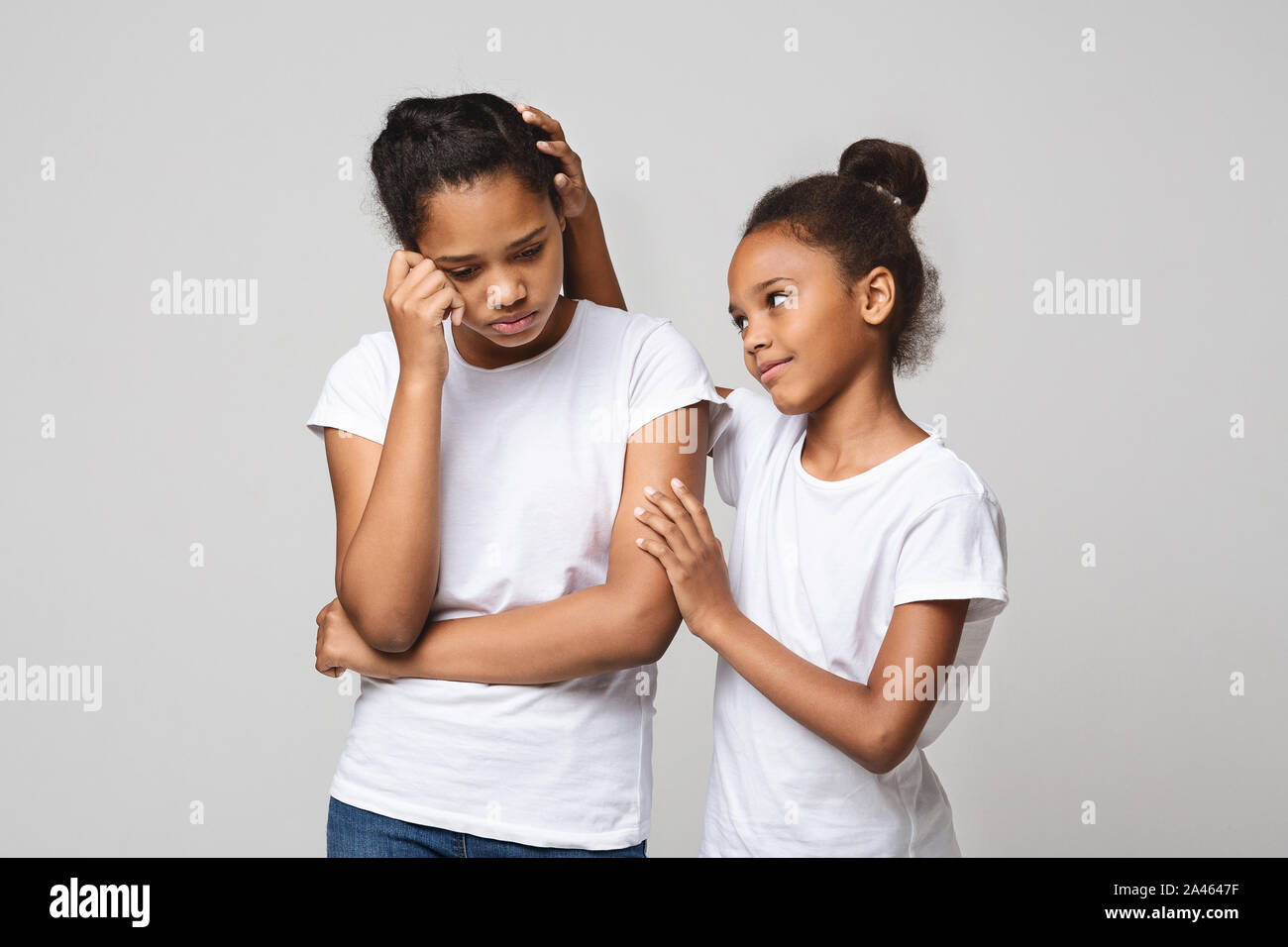 Two Sad Girls Hugging