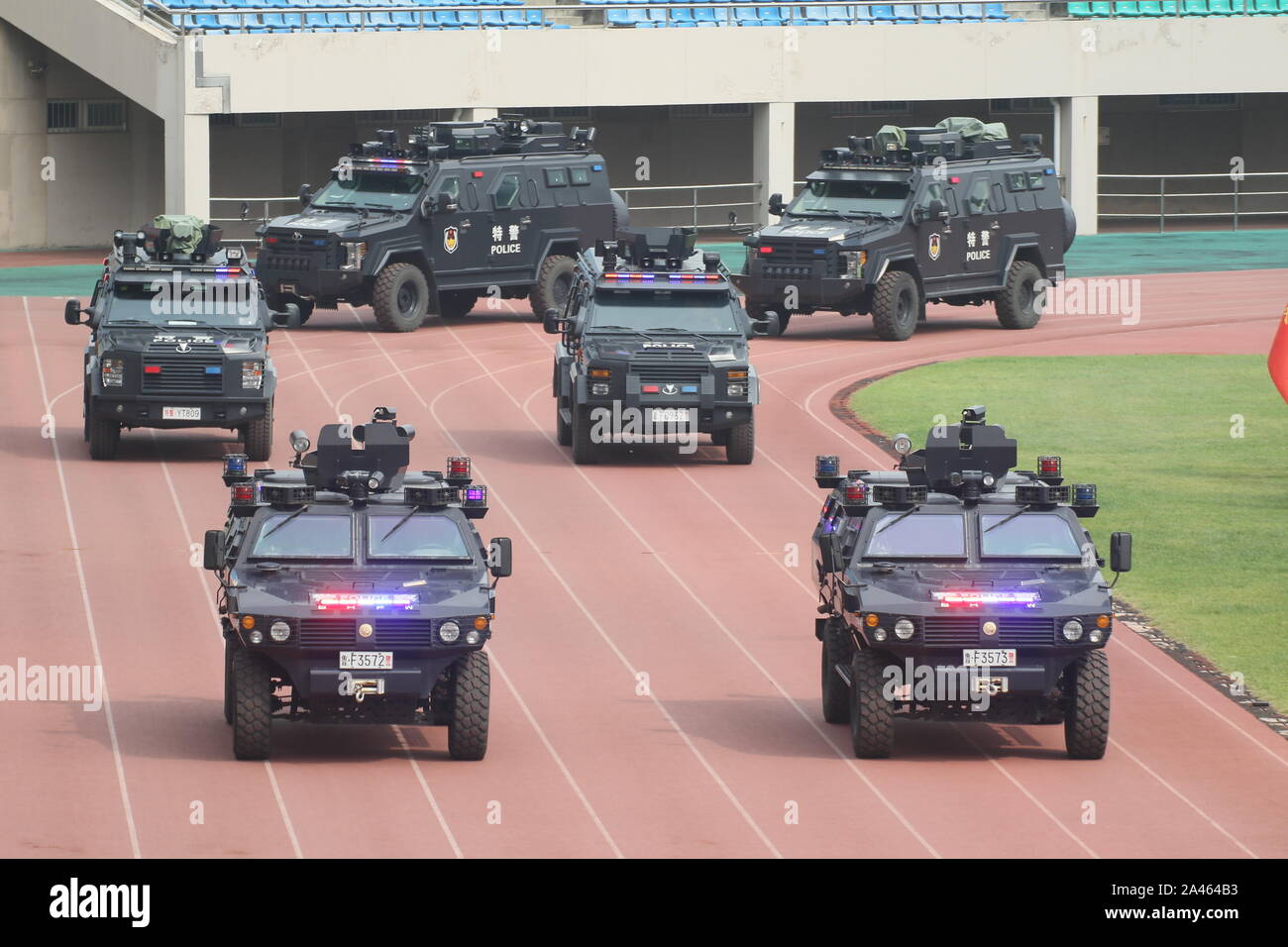 Policemen gather to train themselves with various equipment including ...