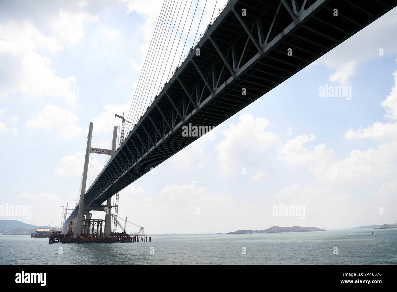 Chinese workers labor at the Pingtan Strait Road-rail Bridge, the world ...