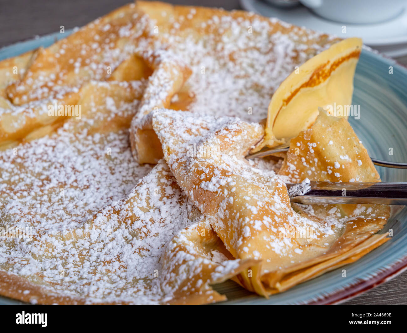 Fresh crepes with powdered sugar Stock Photo - Alamy