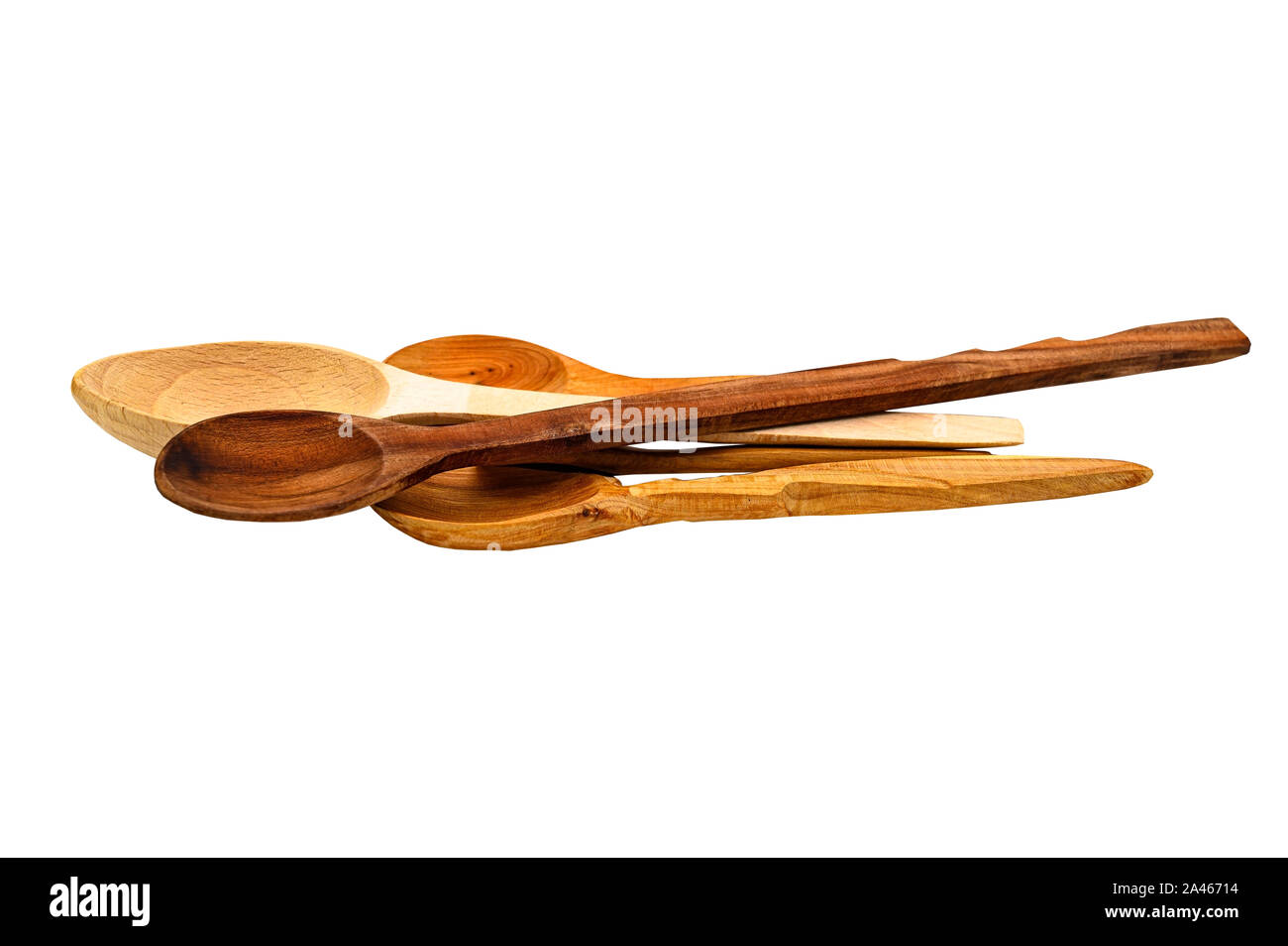a few wooden spoons. isolate on a white background Stock Photo - Alamy