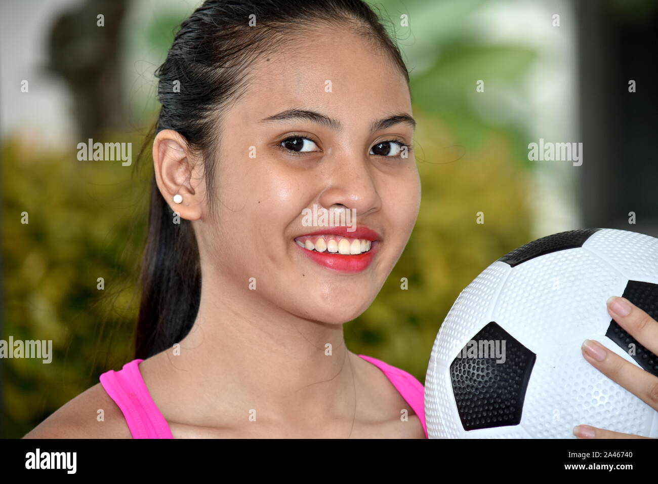 Smiling Athlete Female Soccer Player Stock Photo - Alamy
