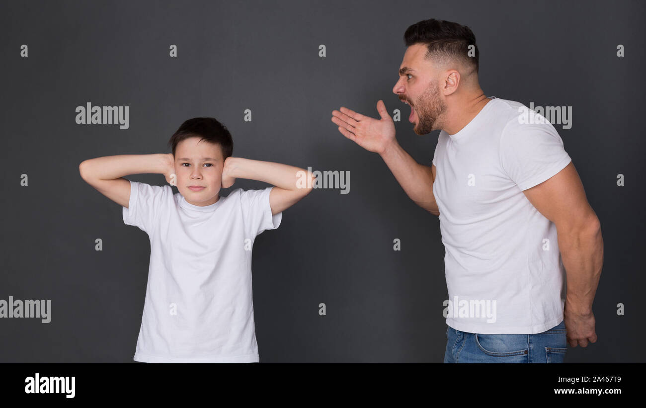 Scared child and angry father hi-res stock photography and images - Alamy