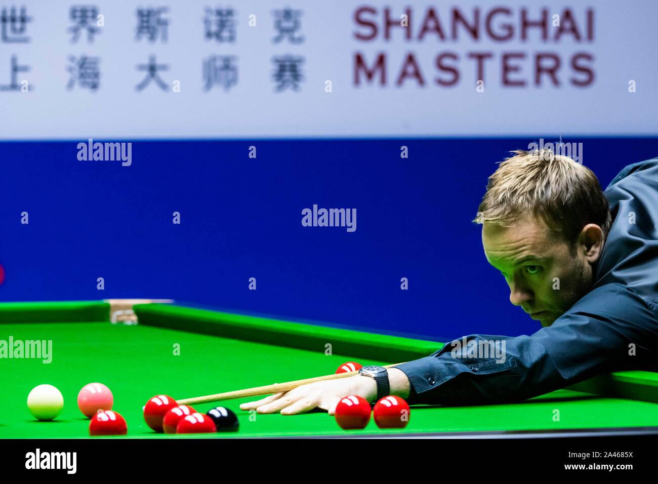 English professional snooker player Allister Carter plays a shot at the ...