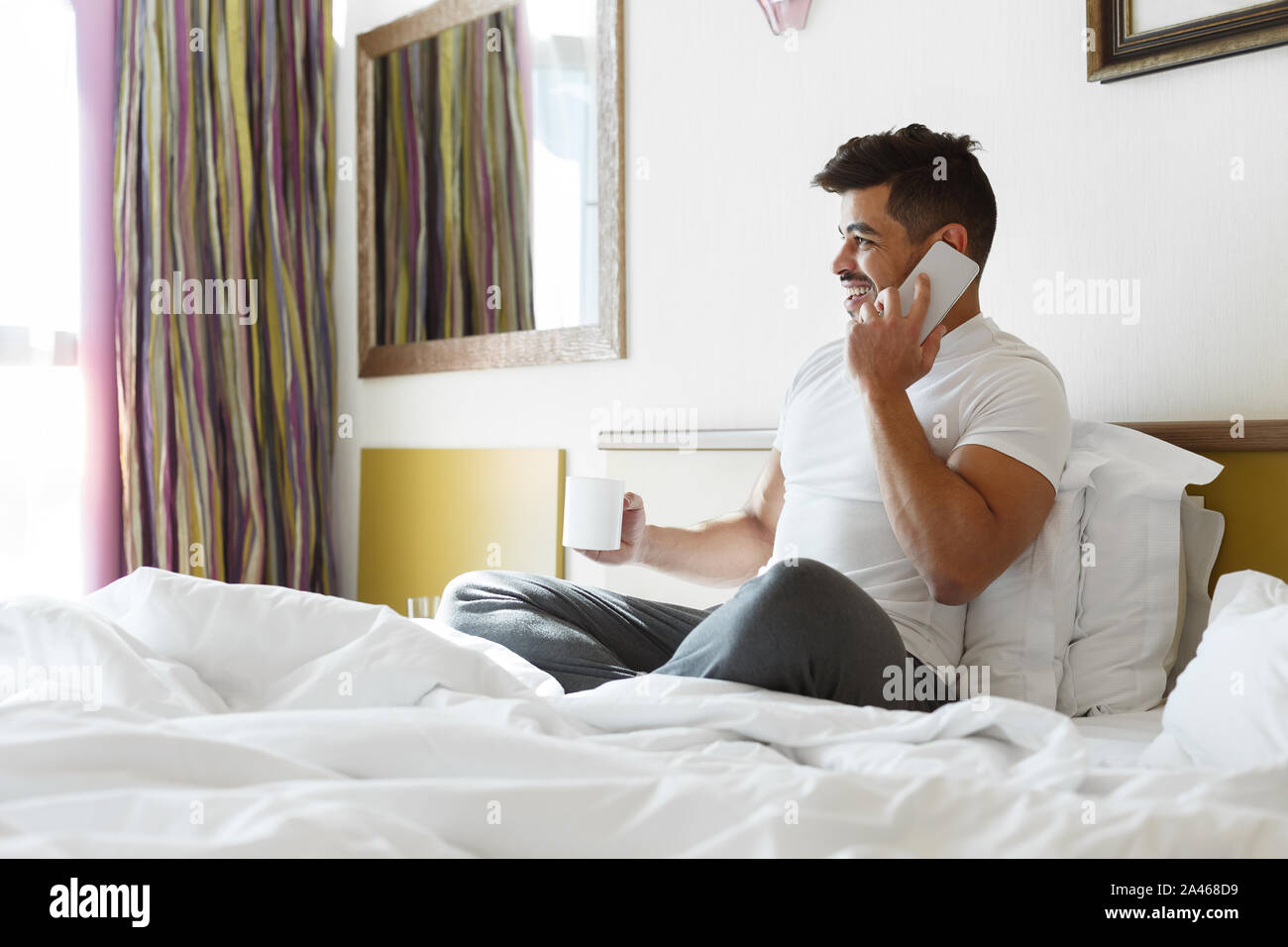 Man laughing telephone talking hi-res stock photography and images - Alamy