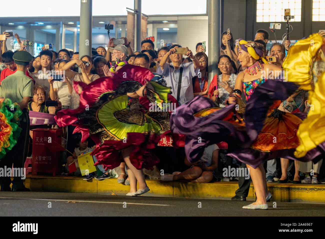 Performers dance and play the instruments during the fancy parade of ...