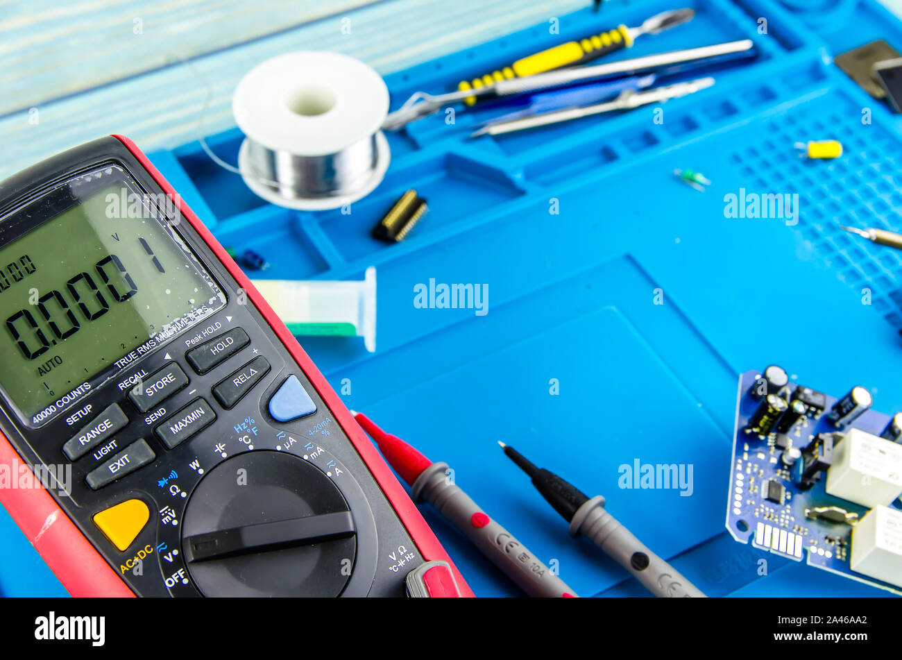 The electrician's workplace. Electronics. Schemes soldering iron ...