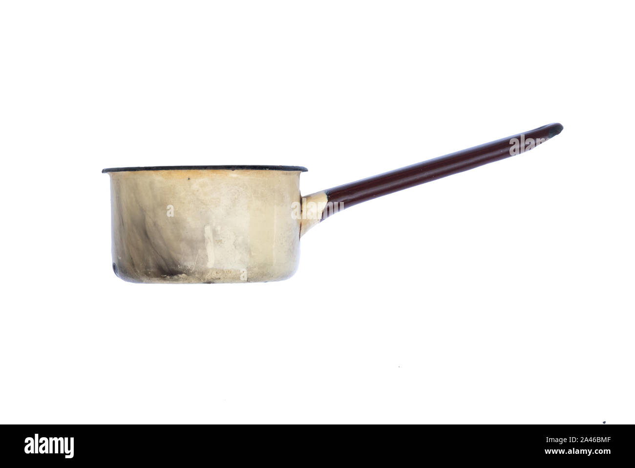 Old kitchen ladle isolated on a white background Stock Photo - Alamy
