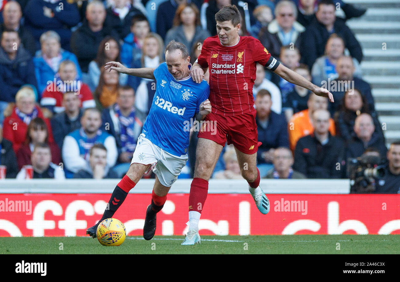 Liverpool's Steven Gerrard (right) and Rangers' Trevor Steven during ...