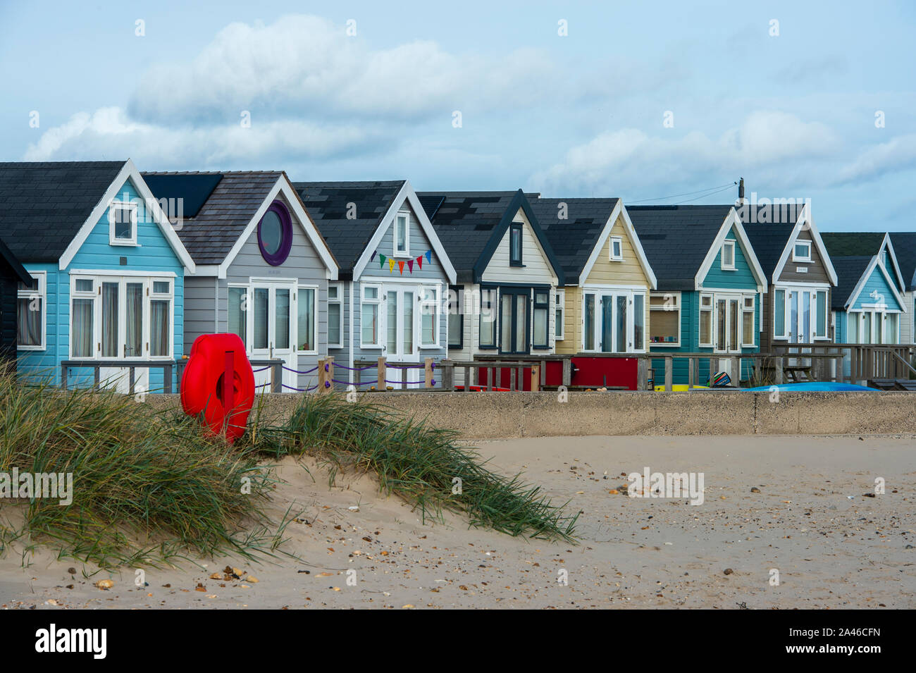 Holiday Beach huts along the picturesque Mudeford Spit at Hengistbury ...