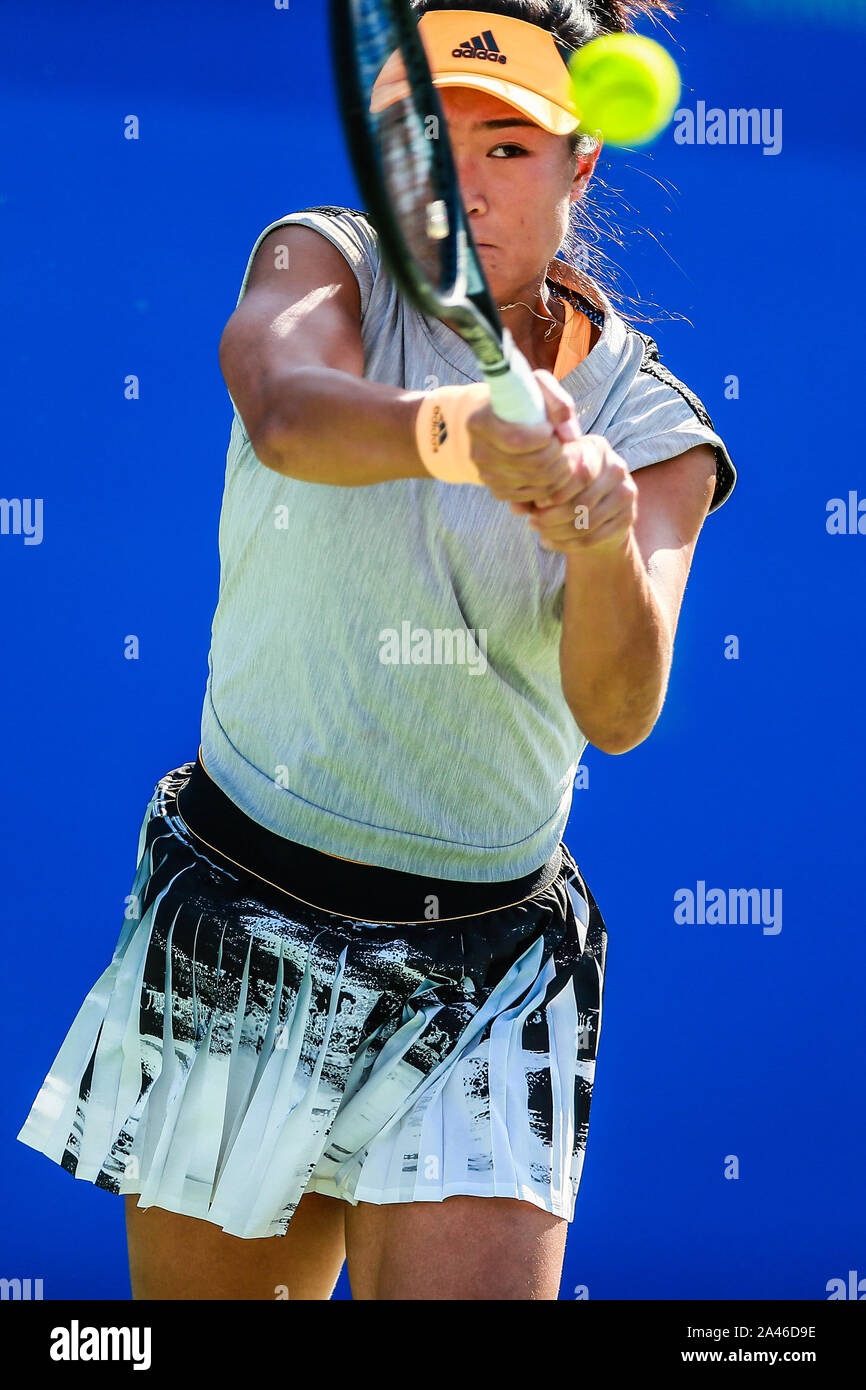 Xinyun Han of China catches the ball against Fiona Ferro of France at ...