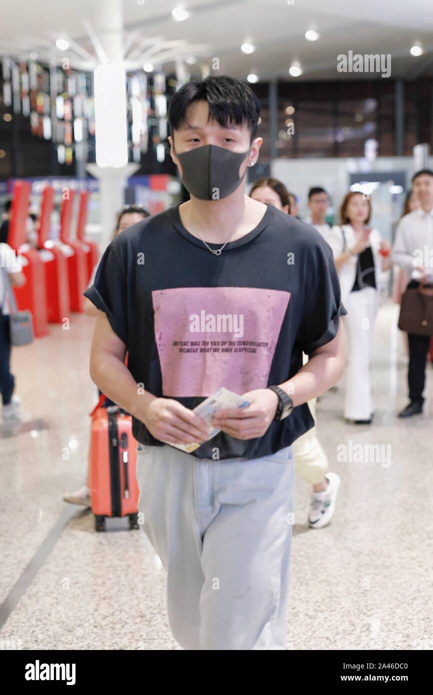 Chinese singer-songwriter and producer Li Ronghao arrives at the Shanghai Hongqiao Airport ...