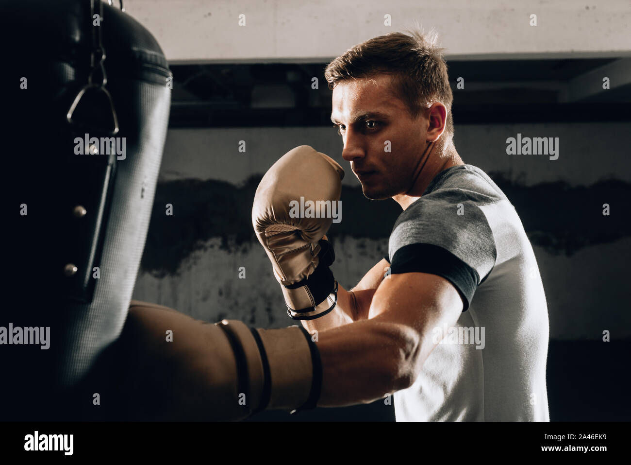 Boxer punching sand bag hi-res stock photography and images - Alamy