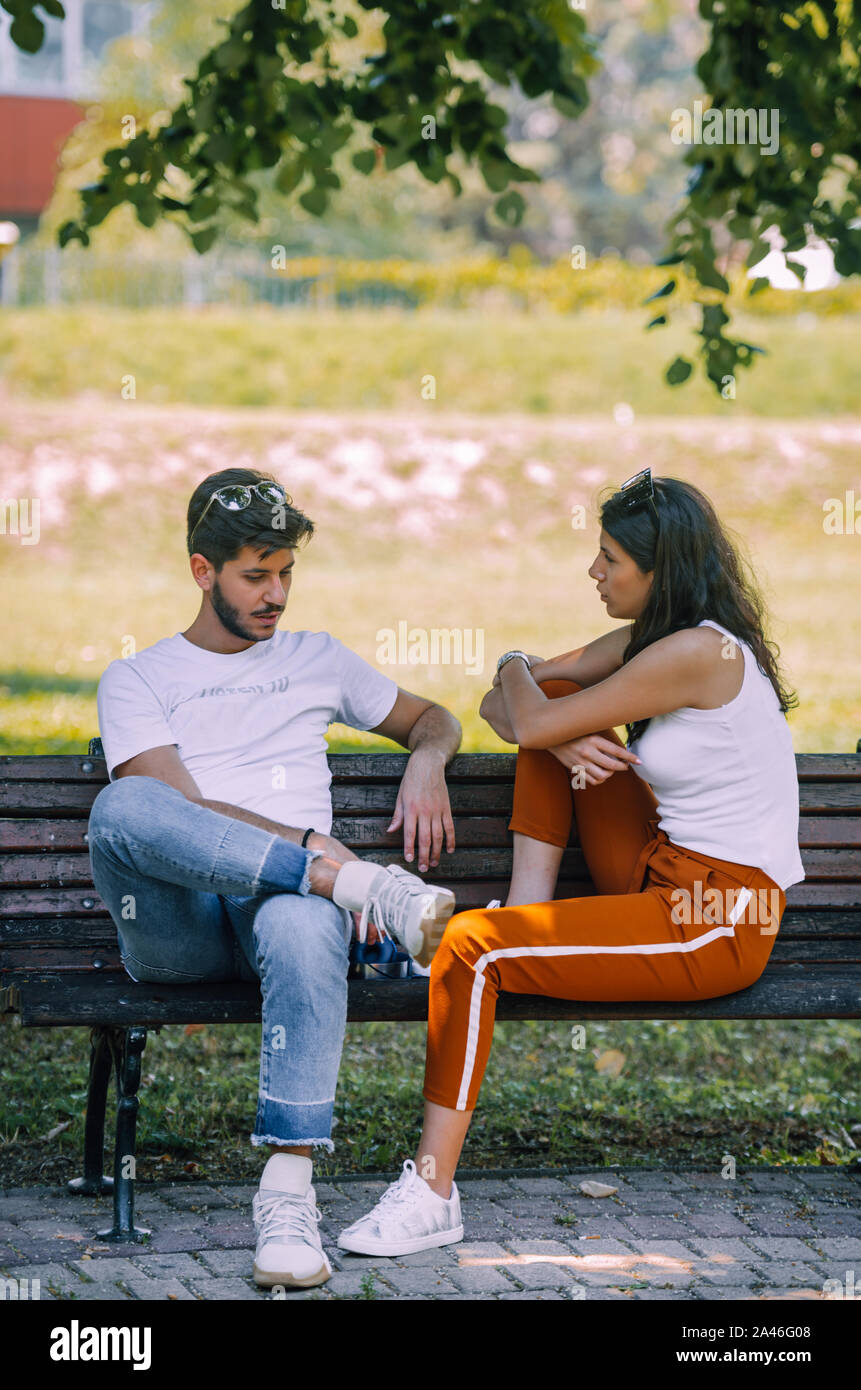 Young man woman quarreling sitting hi-res stock photography and images ...