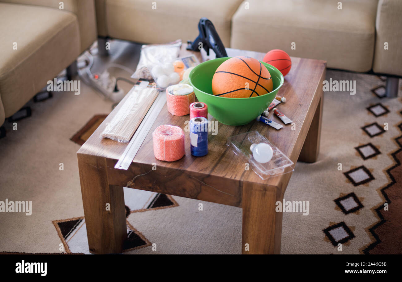Table full of toys and science stuff for education of a child Stock ...