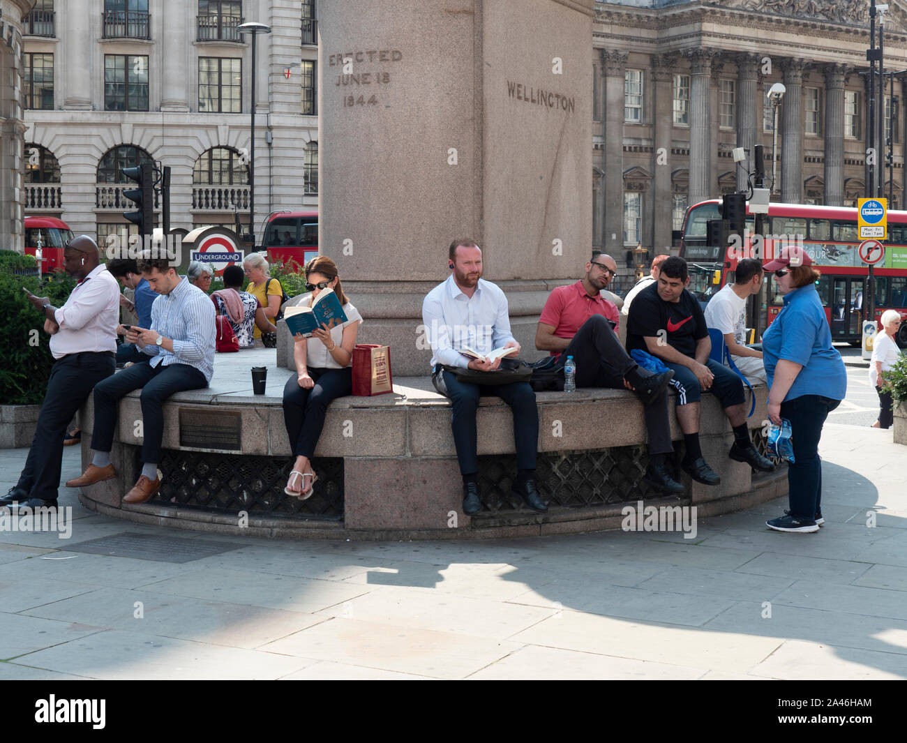 office workers taking a break during lunch hour in sun Stock Photo - Alamy