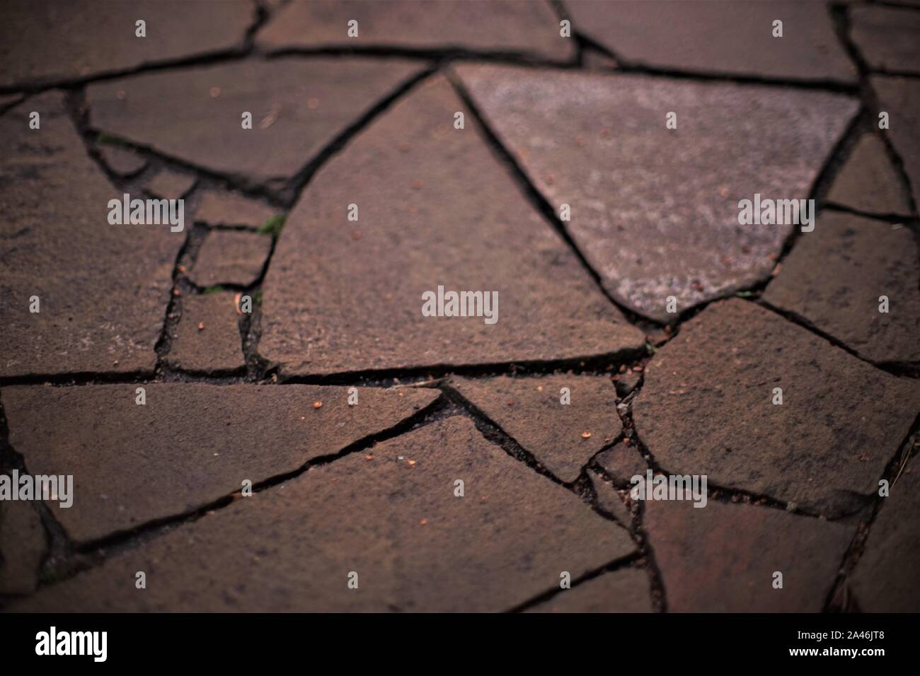 Wild stone floor closeup. Irregular shapes pattern Stock Photo - Alamy
