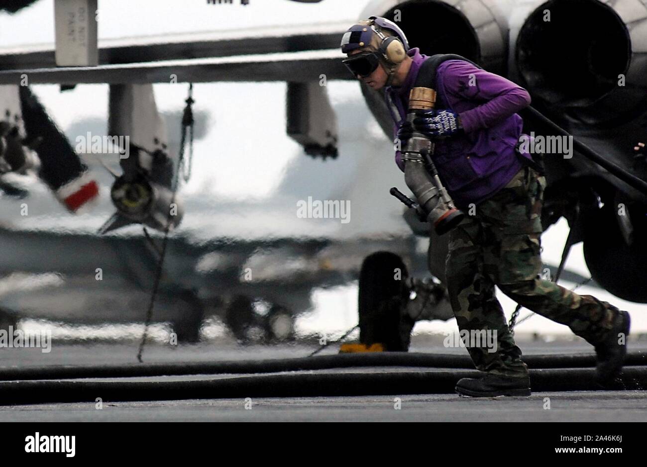 FD Aviation fuel handler CVN-75 3Jan2008 Stock Photo - Alamy