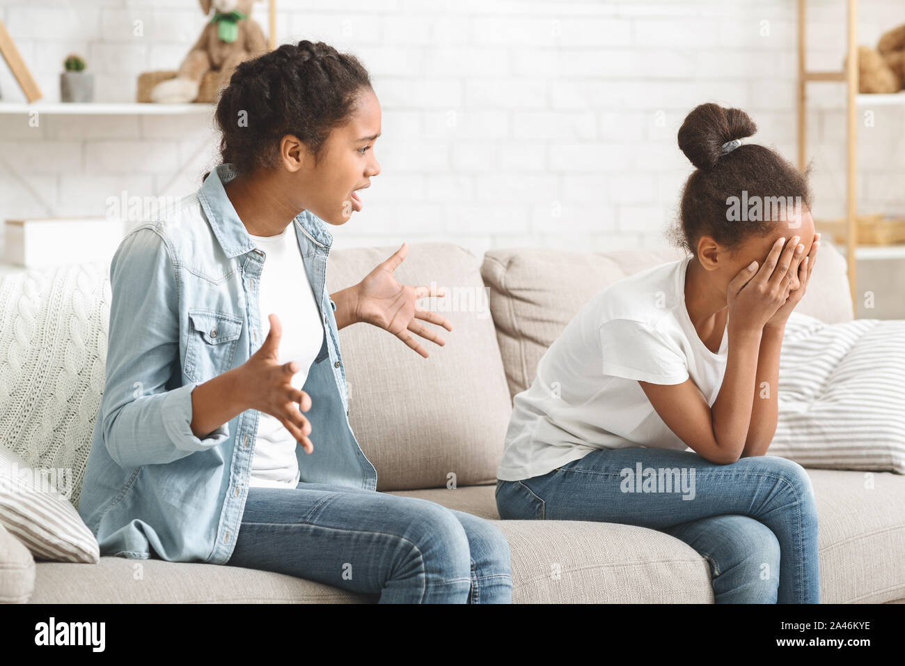 Older sister fighting younger sister hi-res stock photography and ...
