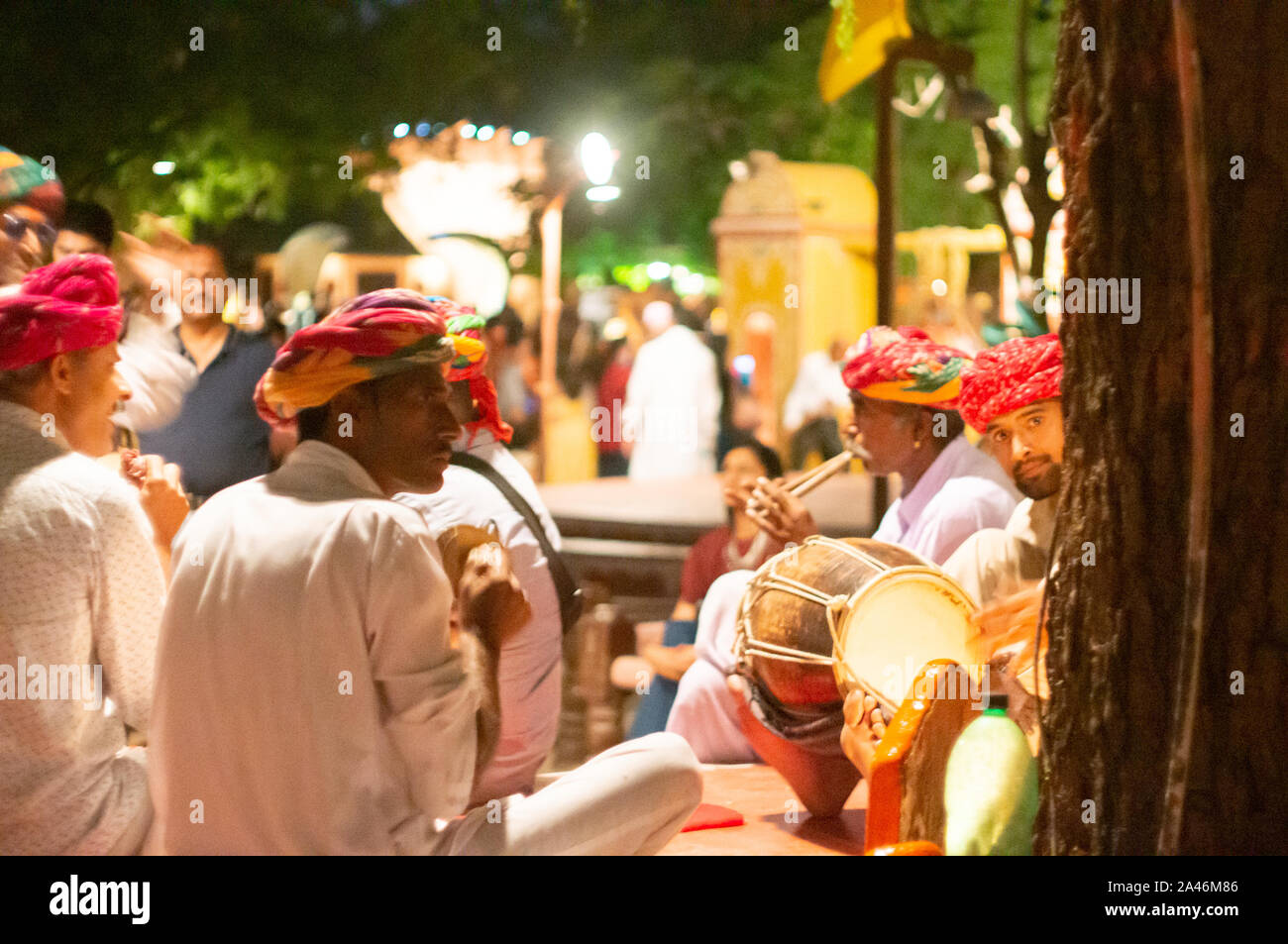 Traditional rajasthani musicians in white kurta and red colorful ...
